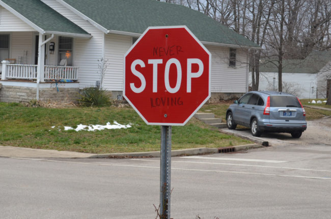 Vandalized Stop Signs With Many Messages | Bloom Magazine